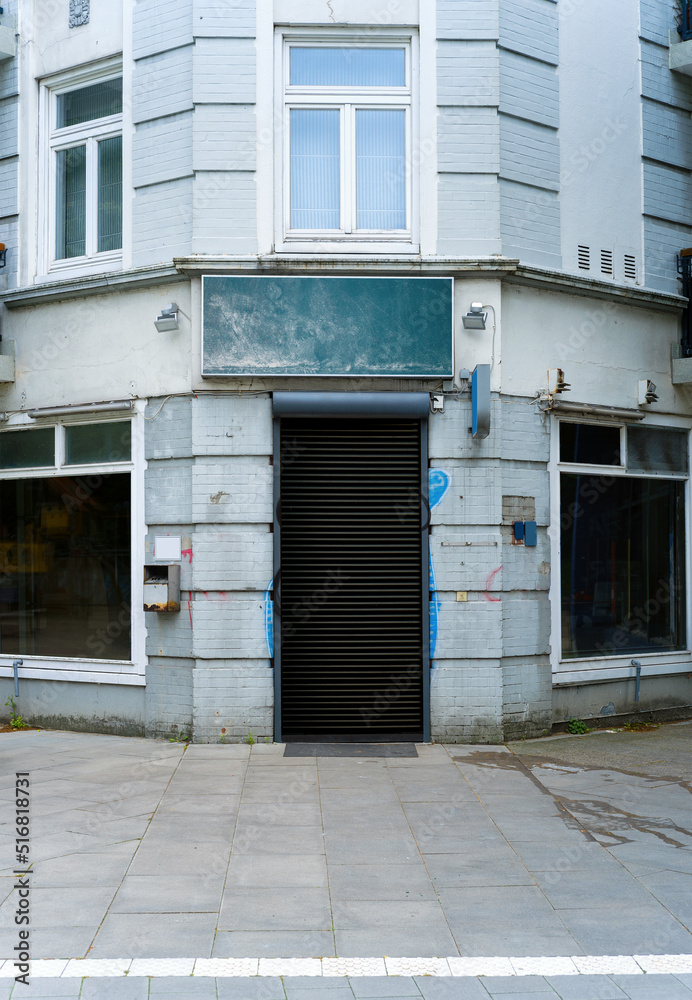 closed and locked drink store in the urban city, many shops remain ...