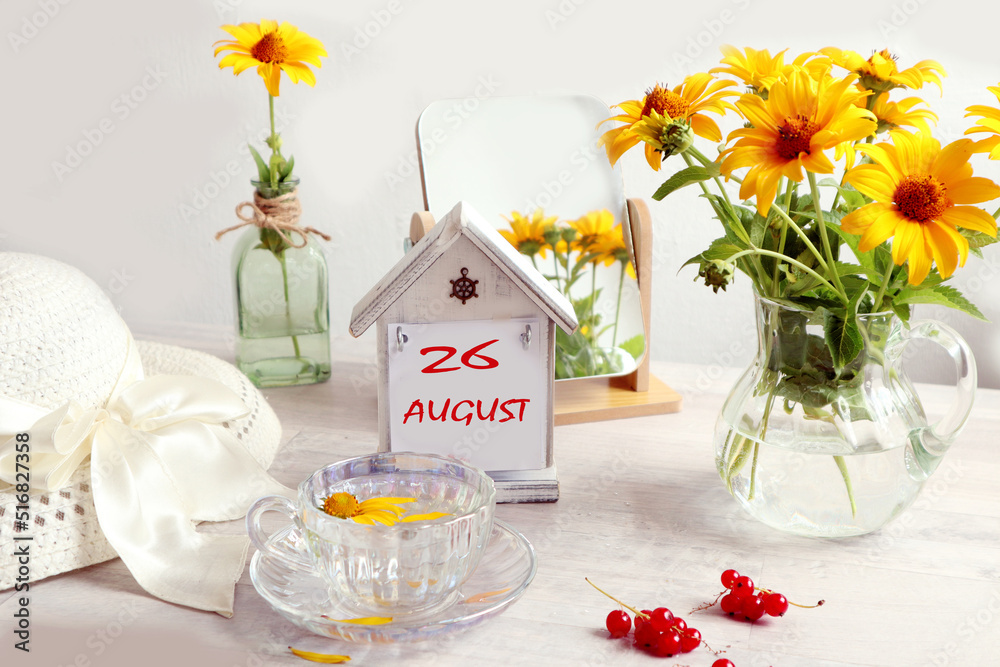 Calendar for August 26: a decorative house with the numbers 26, the ...