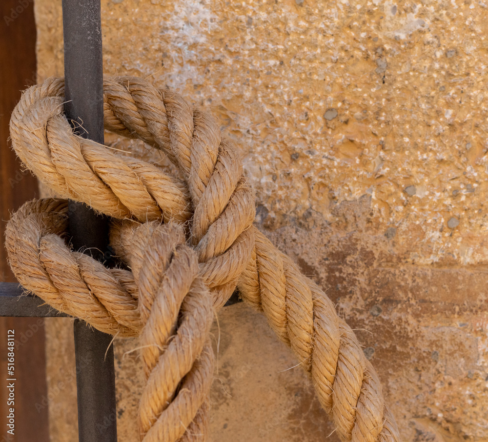 Una cuerda formando un nudo Stock Photo | Adobe Stock