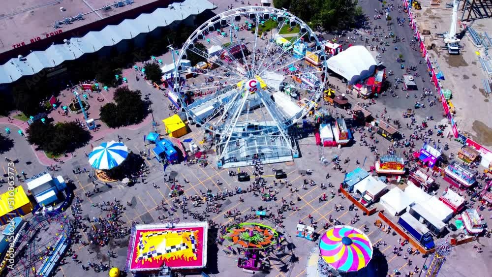 aerial hold top view worlds largest portable Ferris Wheel at 150 feet ...