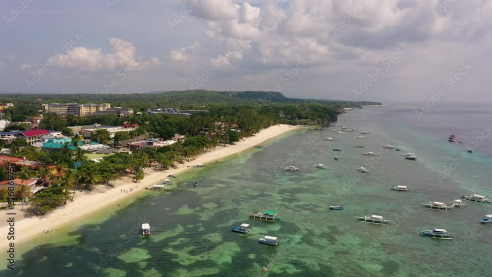 Drone footage along a stretch of coastline in the Philippines with ...