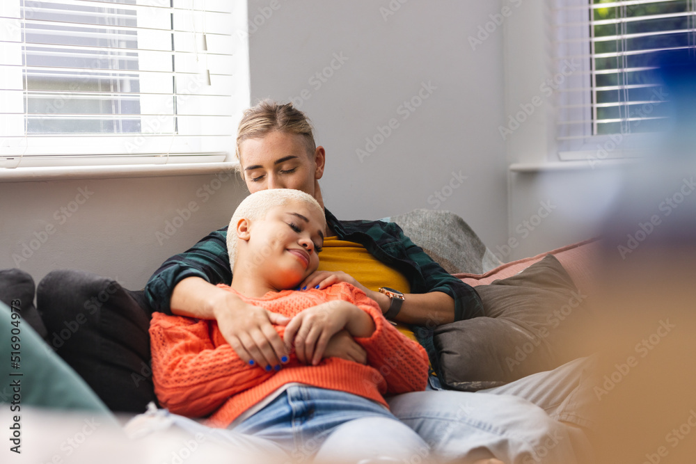 Image Of Happy Diverse Lesbian Couple Sleeping On Sofa Stock Foto