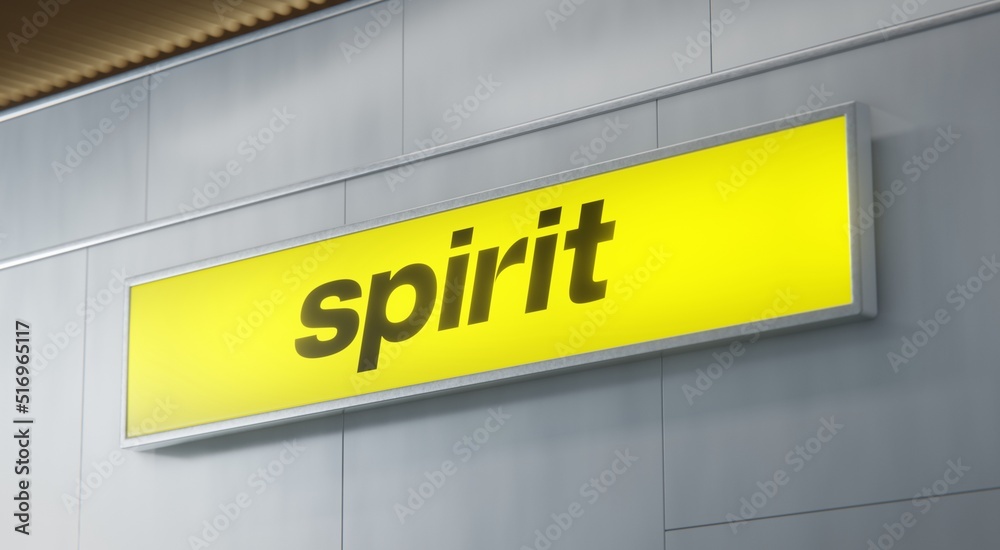 Spirit Airlines logo on illuminated airport sign. Editorial 3D ...
