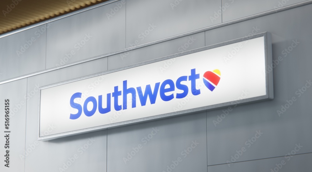 Southwest Airlines logo on illuminated airport sign. Editorial 3D ...