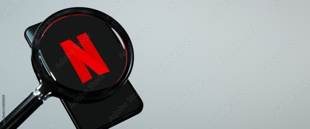 Netflix logo on smartphone under magnifying glass. Editorial ...