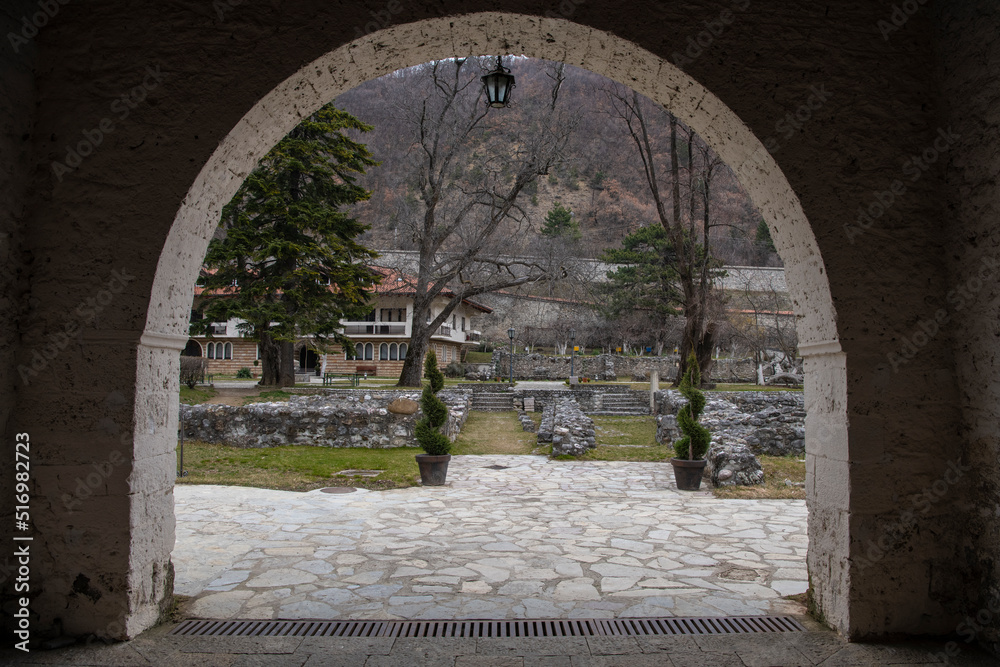 Entrance gate to courtyard of Medieval Monastery and Church Pecka ...