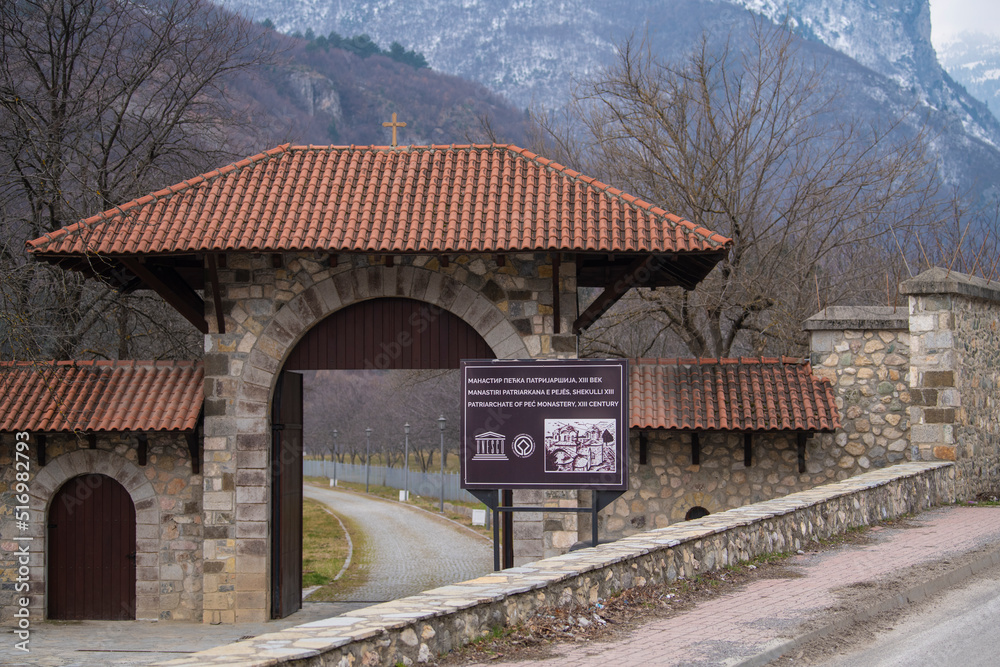 Table sign and Entrance gate to Medieval Monastery and Church Pecka ...