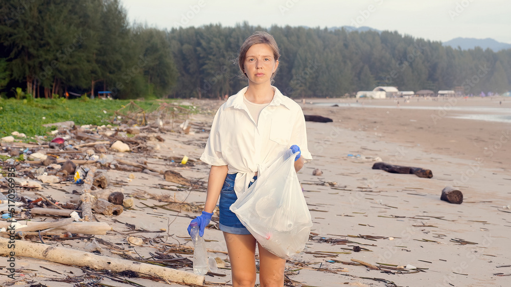 Young woman volunteer shows the camera where to put trash in nature ... Young woman volunteer shows the camera where to put trash in nature ...