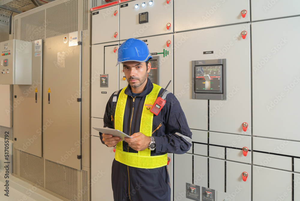 An engineer man or worker, people working in electrical room. Power ...