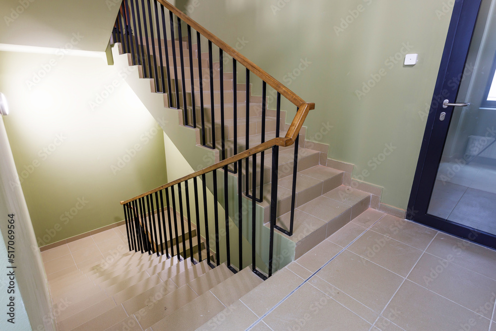 stairs in the new staircase of a high-rise building with a light design ...