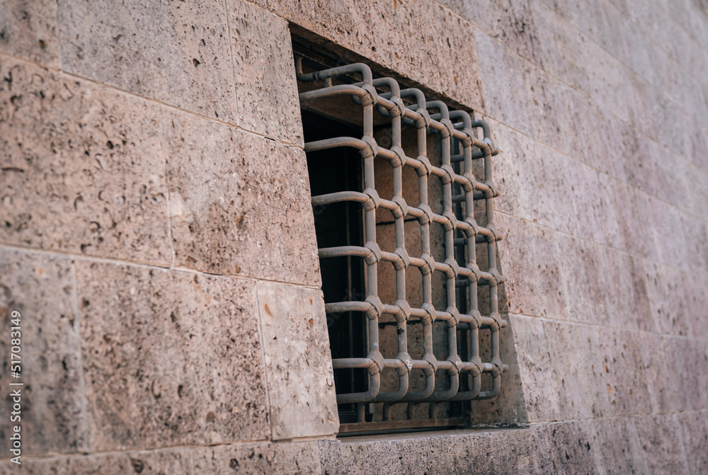 old window in the wall prison jail Stock Photo | Adobe Stock