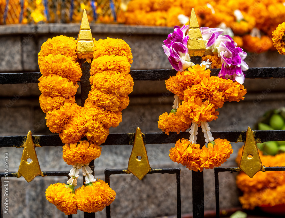 Marigold garlands at the Erawan Buddhist Shrine in Bangkok Stock Photo ...