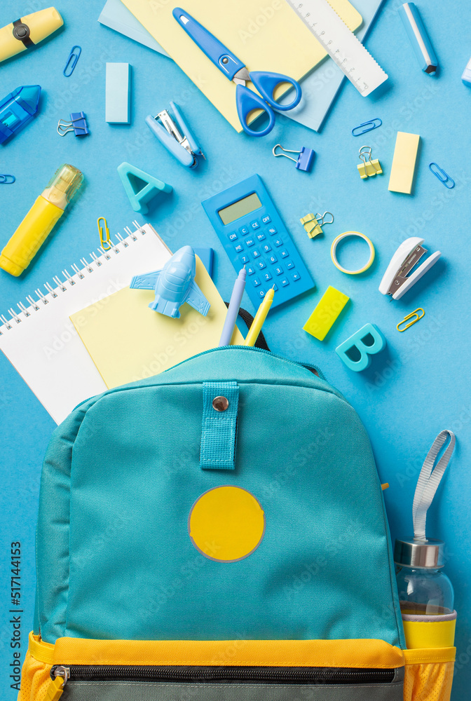 Back to school concept. Top view vertical photo of school supplies ...