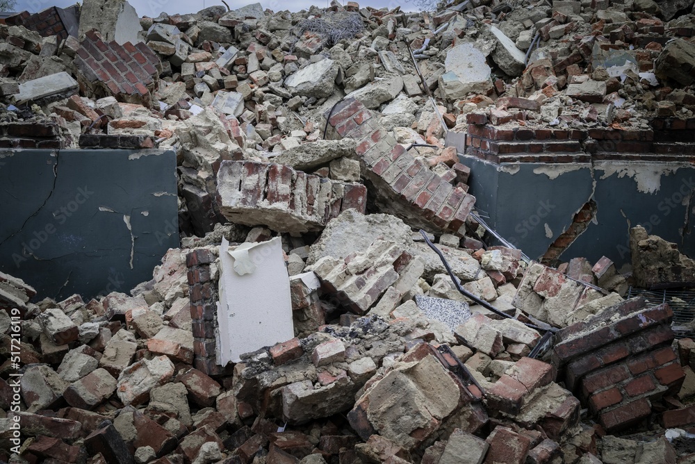 Foto de Pile of bricks at the foundation of a demolished building do ...