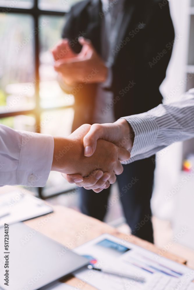 Business handshake for teamwork of business merger and acquisition ...