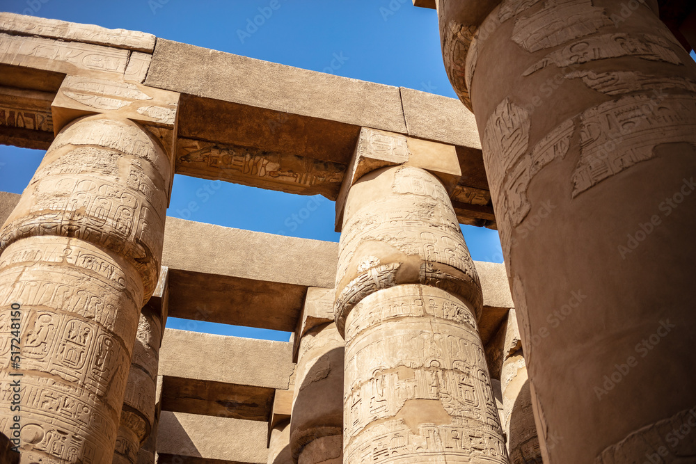 Different hieroglyphs on the walls and columns in the Karnak temple ...