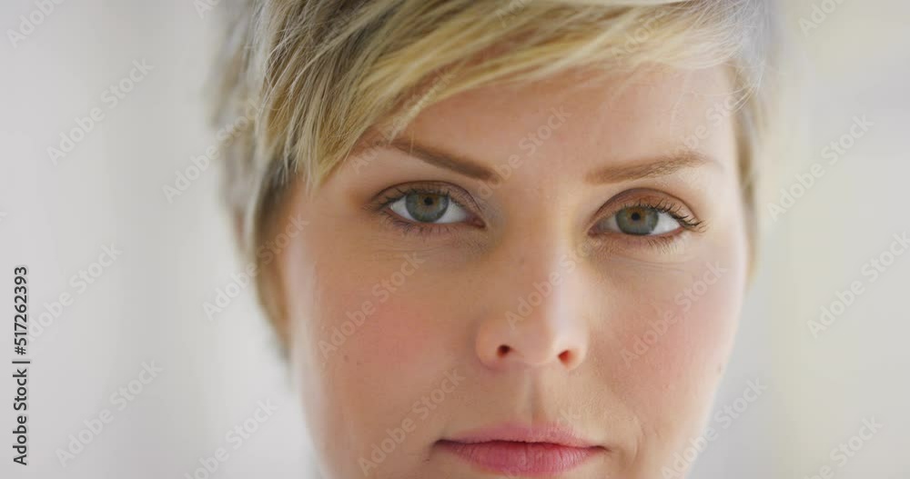 Closeup of womans eyes looking forward with curious look. Headshot ...