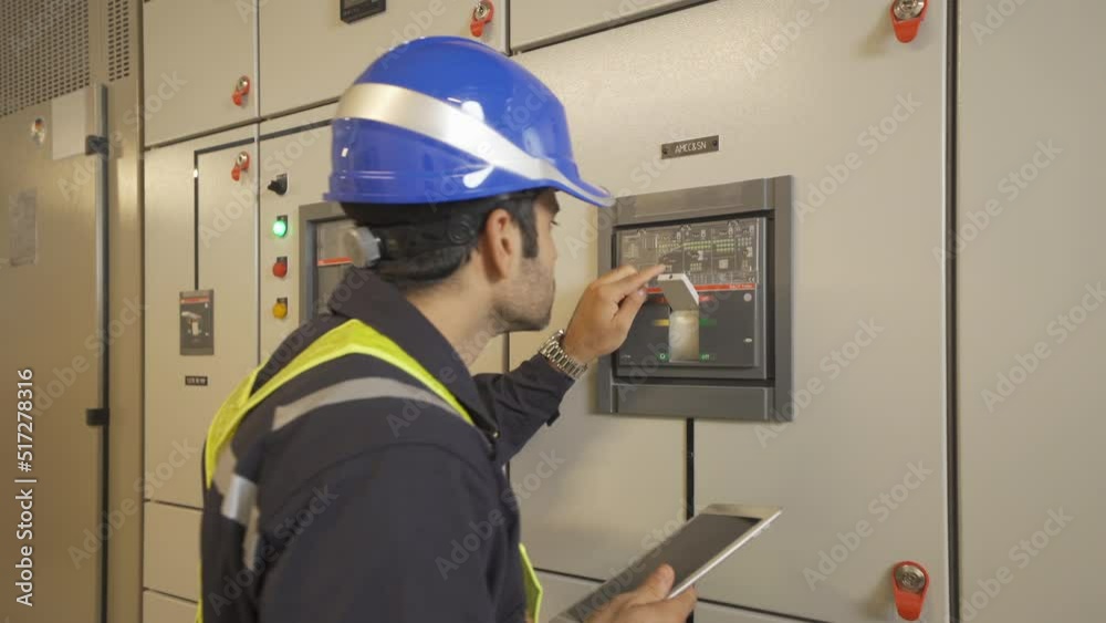 An engineer man or worker, people working in electrical room. Power ...