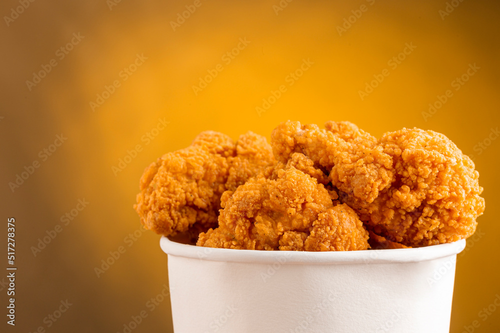Crispy fried chicken in the bucket. Chicken bucket. Stock Photo | Adobe ...