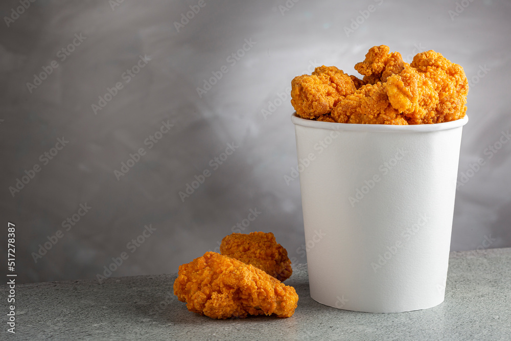 Crispy fried chicken in the bucket. Chicken bucket. Stock Photo | Adobe ...