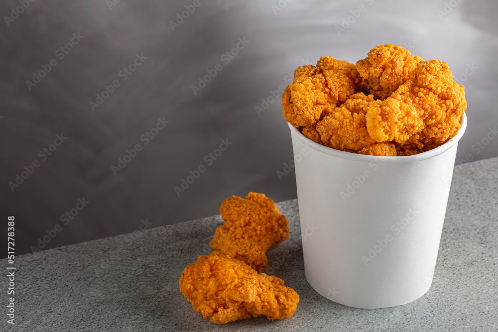 Crispy fried chicken in the bucket. Chicken bucket. Stock Photo | Adobe ...