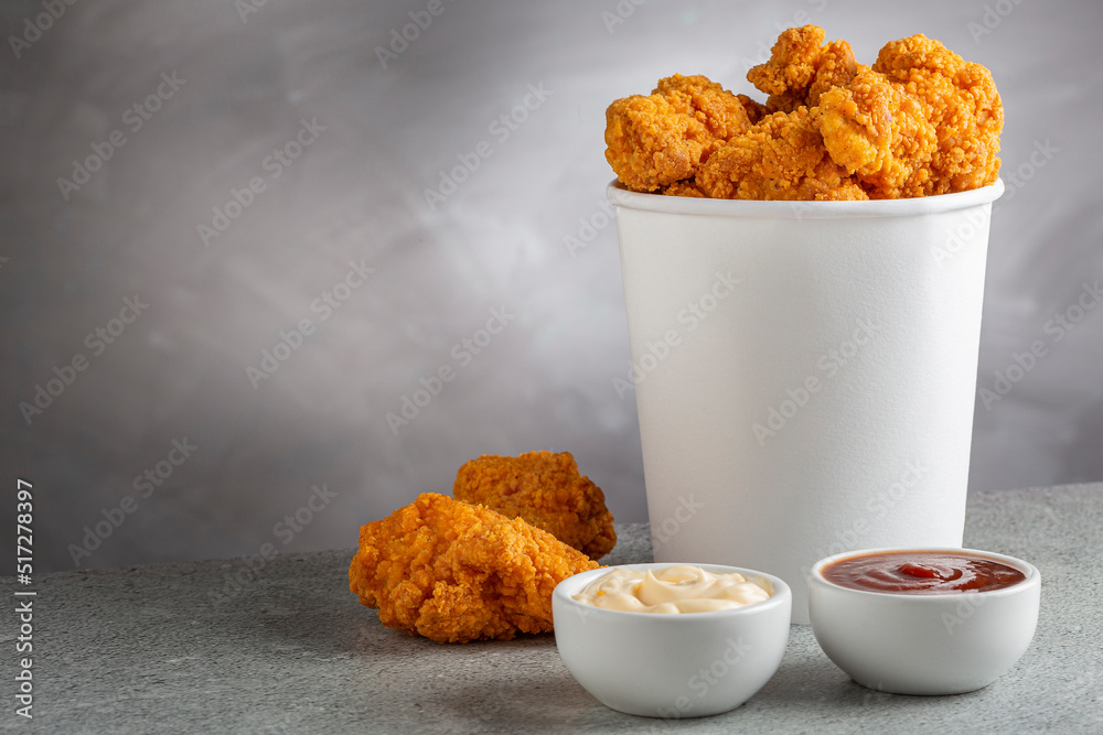 Crispy fried chicken in the bucket. Chicken bucket. Stock Photo | Adobe ...