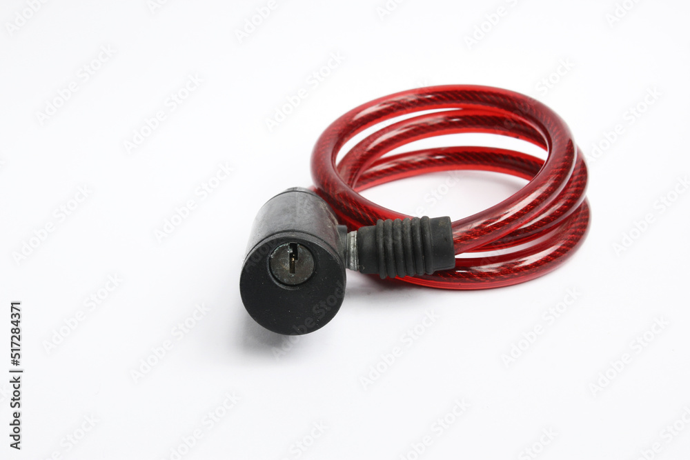 flexible red cable padlock for bicycle safety when parking, isolated ...