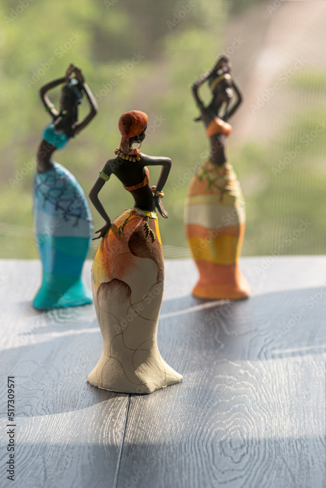 Imitation of ritual African dances. Picturesque figurines of African ...