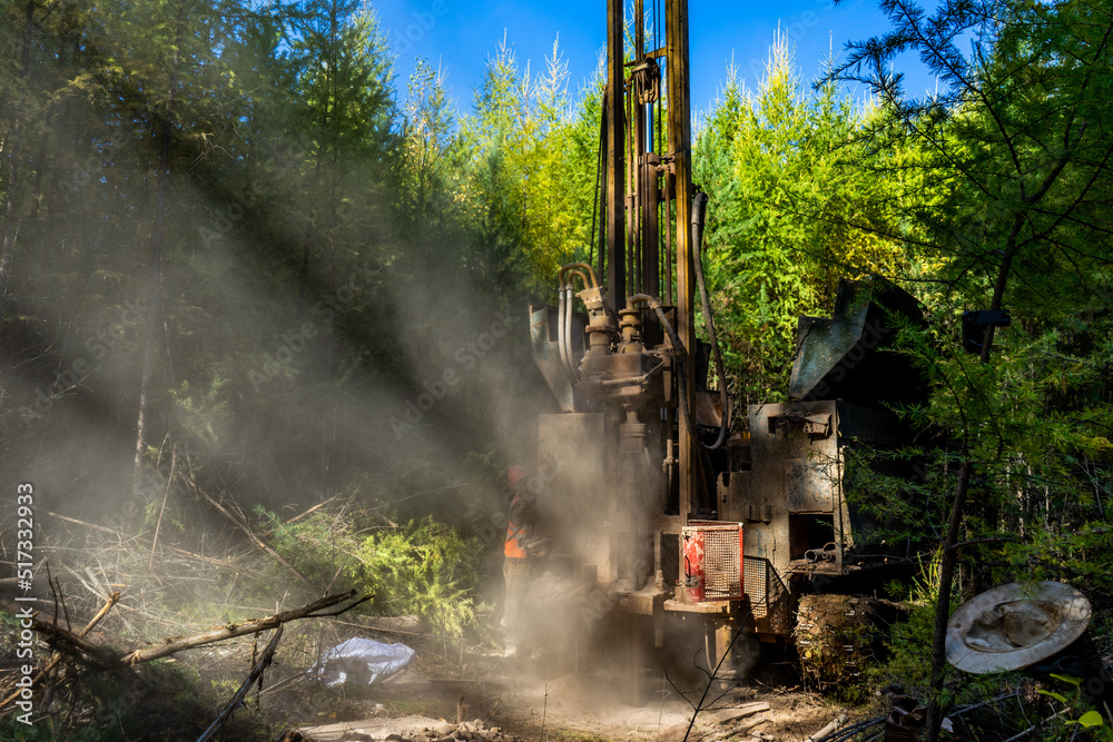 Working process of drilling a geological well. Dust when drilling ...