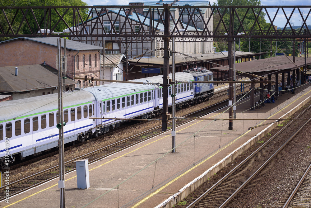 RAILWAY TRANSPORT - Passenger express train enters to station Stock ...