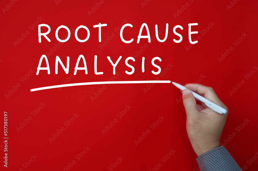 Root cause analysis text on red cover background. Investigation concept ...