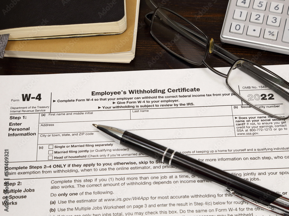 An IRS W-4 Employees Withholding Certificate form, issued in 2022, is ...