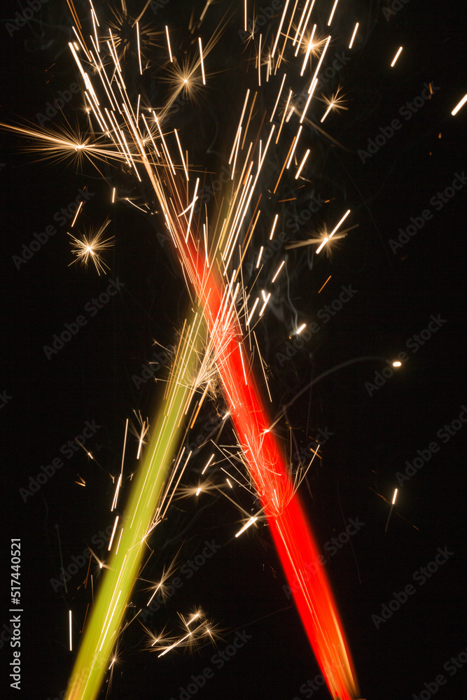red and green flames with sparks on a black background Stock Photo ...