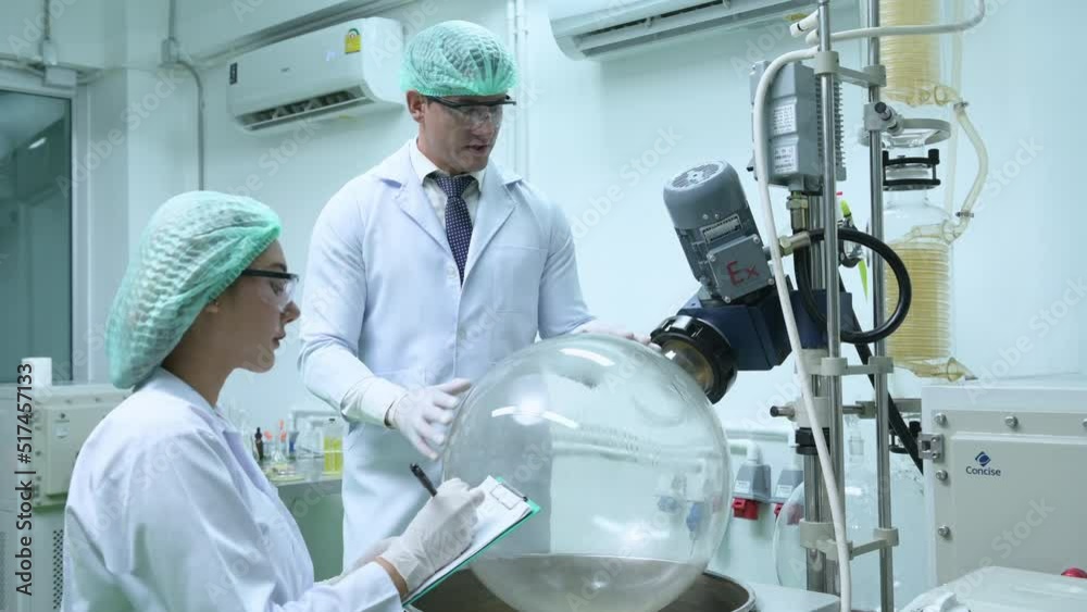 Scientists and assistants are in the machine room extracting oil and ...