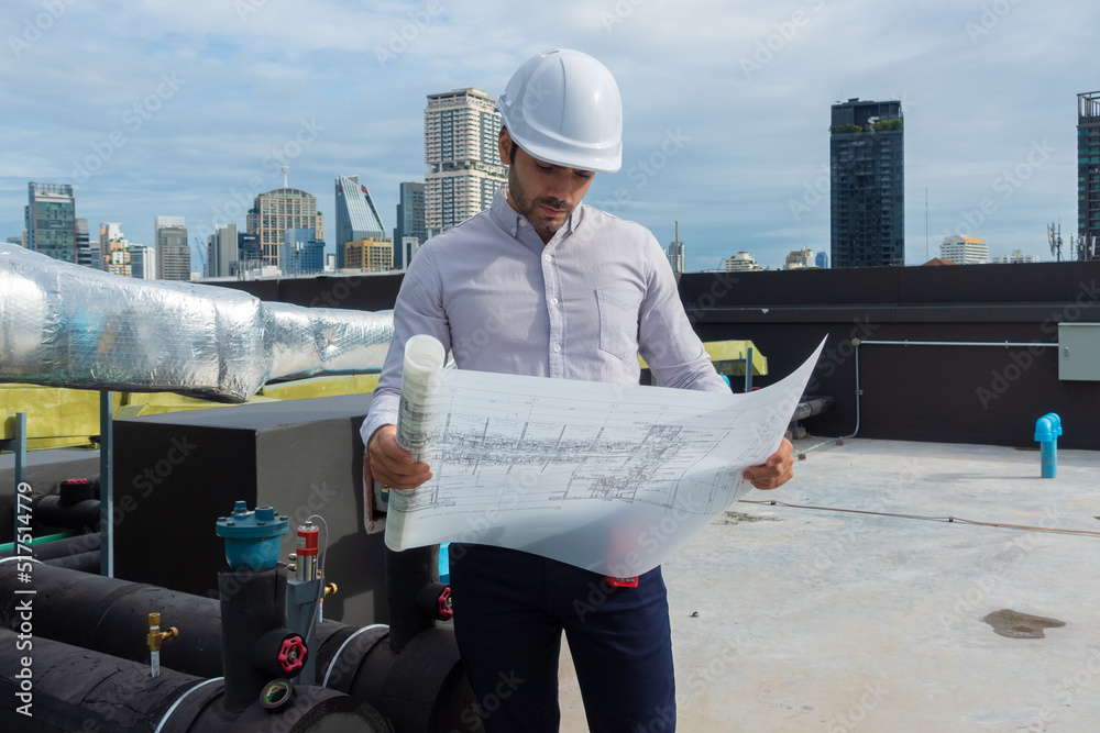 Engineer under checking the industry chilled water fan coil unit air ...