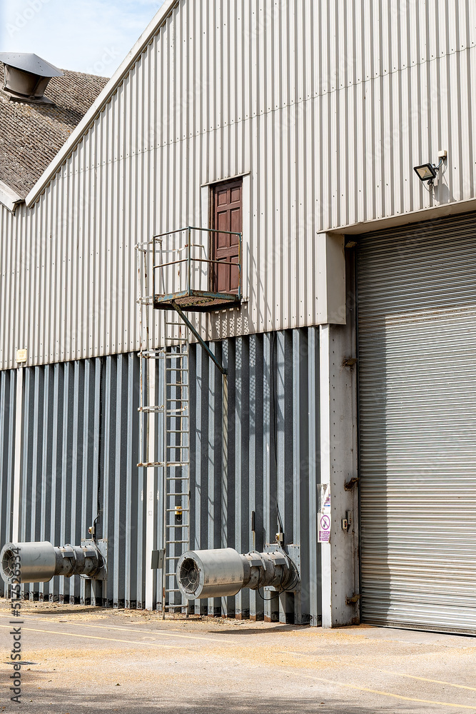 Painted, panelled wooden door usually found in a house seen fitted to ...
