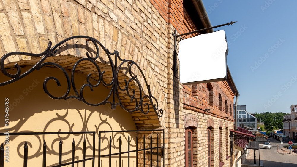 Square signboard mockup at old city brick building. Board for ...