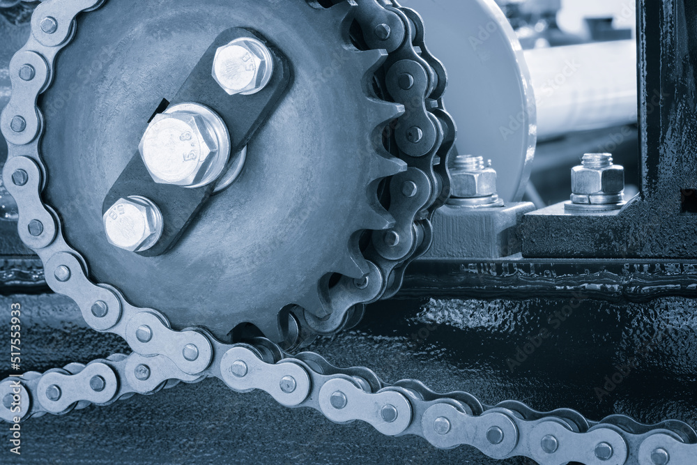 Gear chain drive shaft in conveyor belt is on production line. Timing ...