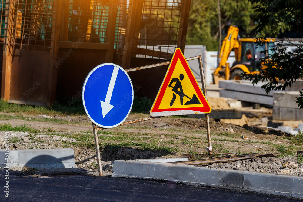 Road signs!Road works with trucks and traffic signs.road works road ...