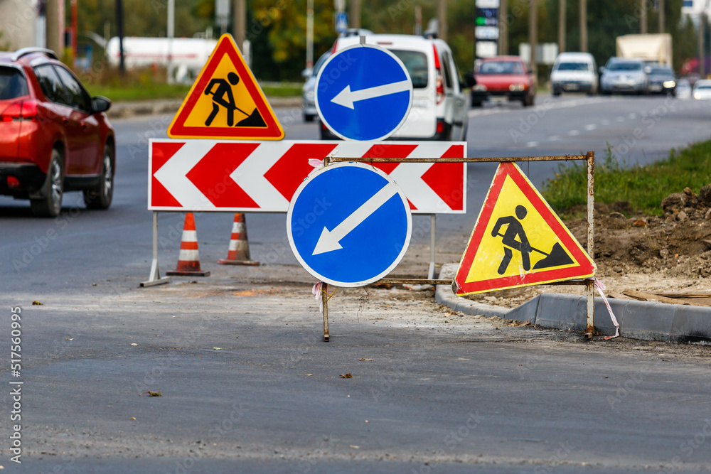 Road signs!Road works with trucks and traffic signs.road works road ...