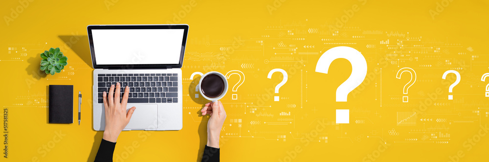 Question marks with person using laptop computer Stock Photo | Adobe Stock