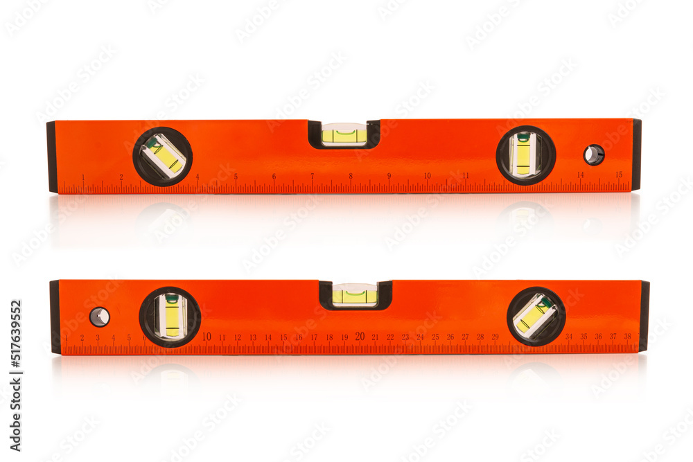 Yellow building level or water level meter with a ruler isolated on ...