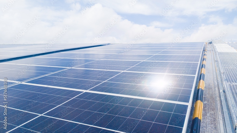 Solar Panel Installed on industrial building roof with solar roof ...