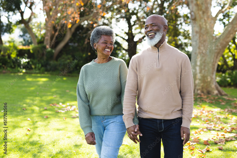 Image of happy african american senior couple in garden Stock Photo ...