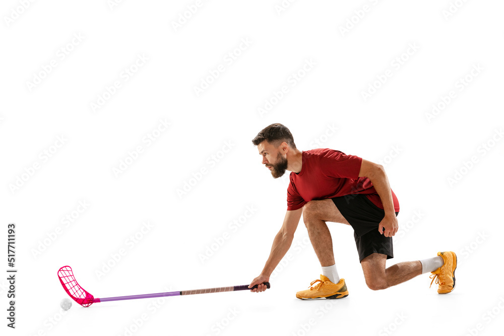 Dynamic portrait of male floorball player with floorball stick in ...