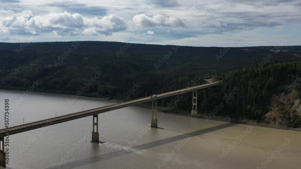 Aerial view of a car crossing Yukon river bridge known as the E. L ...