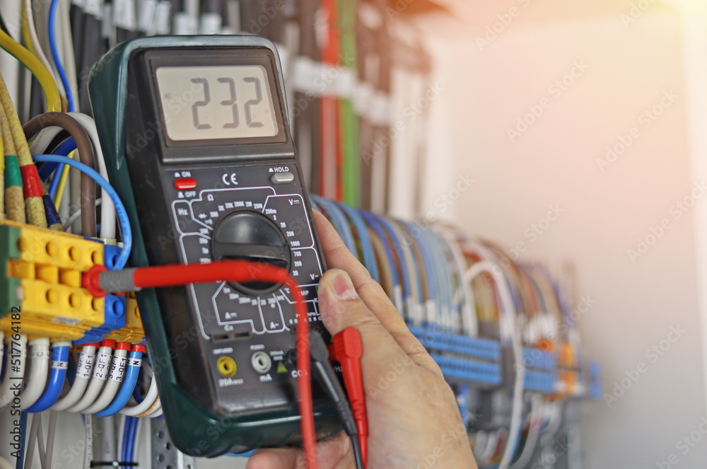 Measurement of control panel parameters using a digital multimeter ...