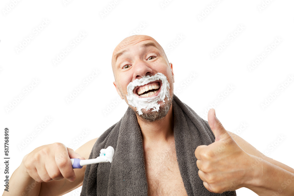 Сlose up view of a bald man brushing his teeth with toothpaste with ...
