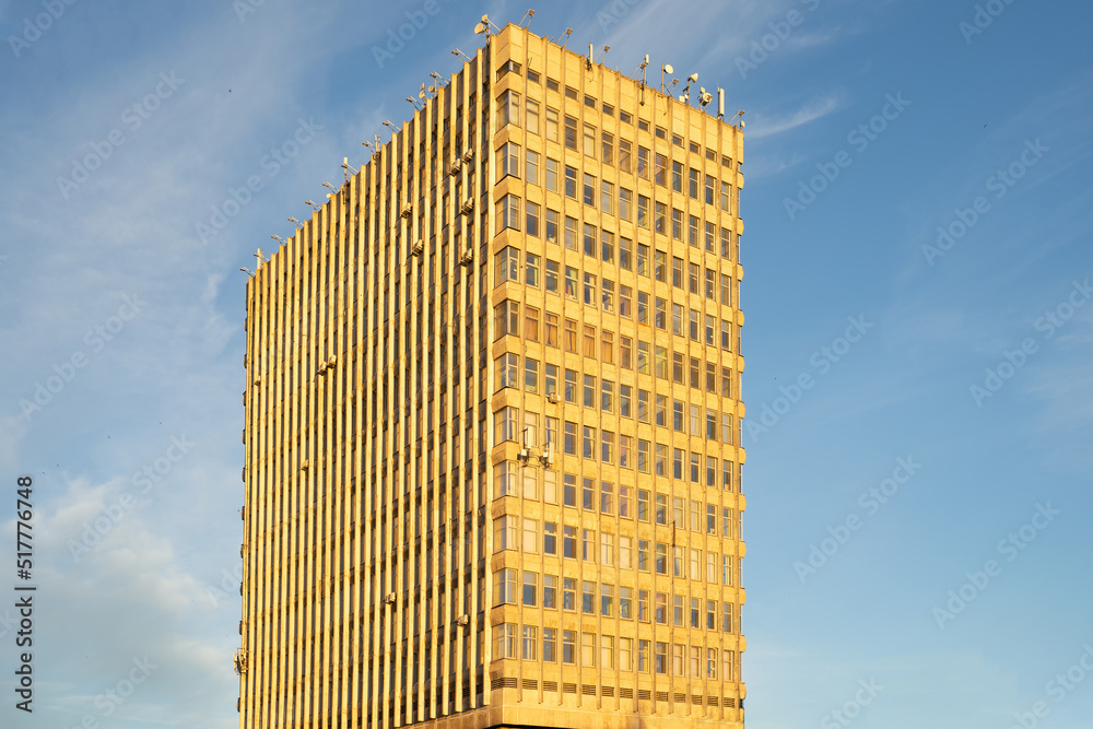 Soviet architecture. Facade of Soviet-era building. The building is in ...
