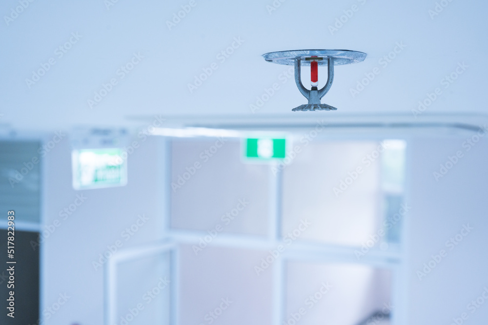 Fire fighting equipment, sprinkler on white ceiling background ...